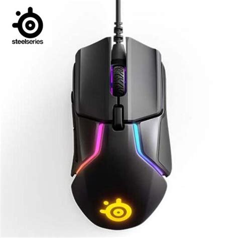 A Computer Mouse That Is On Top Of A White Surface With The Light Up Logo