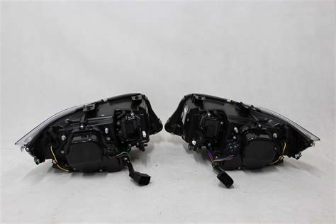 Lampy reflektory przednie przód BMW E90 05 08 D1S RINGI LED U BAR igła