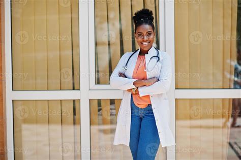 African American Doctor Female At Lab Coat With Stethoscope Posed