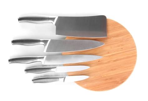 Premium Photo Set Of Knives Isolated On White