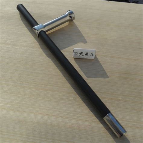 A Pen Sitting On Top Of A Wooden Table