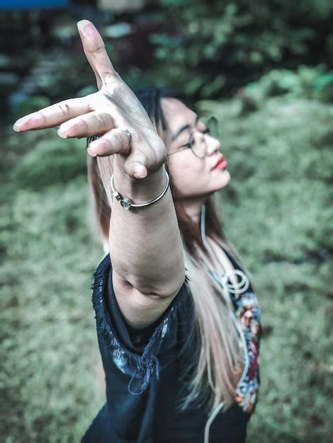 Premium Photo Low Section Of Woman Holding Hands