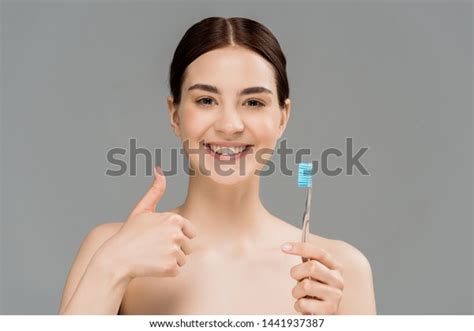 Cheerful Naked Woman Holding Toothbrush While Stock Photo 1441937387