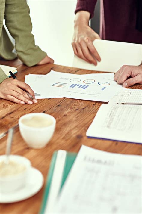 Hands Documents And Business People In Meeting Graphs And Teamwork