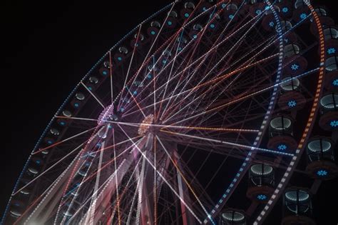 Premium Photo Low Angle View Of Illuminated Ferris Wheel Against Sky