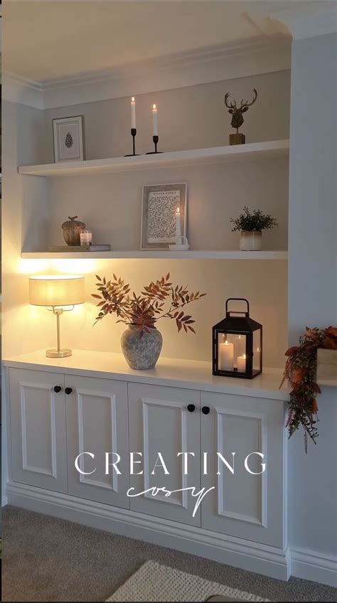 A Living Room Filled With Lots Of Furniture And Candles On Top Of It S