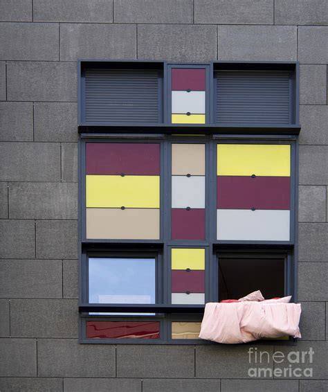 Bed Sheet In A Building Window Photograph By Bernard Jaubert Pixels