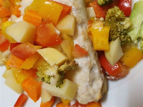 Filets de colin au four et aux légumes Recette de Filets de colin au
