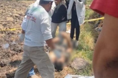 Localizan cadáver flotando en canal de aguas negras en Mixquiahuala