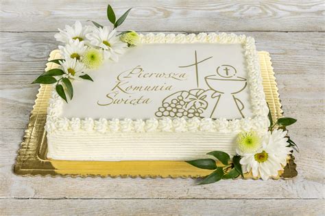 Tort komunijny prostokątny z opłatkiem i kwiatami Cukiernia Jacek