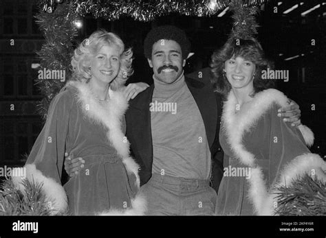 Daley Thompson Turning On The Oxford Street Christmas Lights Assisted By Female Santas Tracy