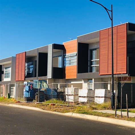 Au Nzs USA Standard Light Steel Frame Prefabricated Townhouse China