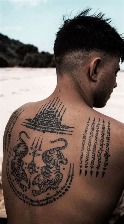 Masculine Mens Spine Tattoos Bold And Powerful Designs Spine