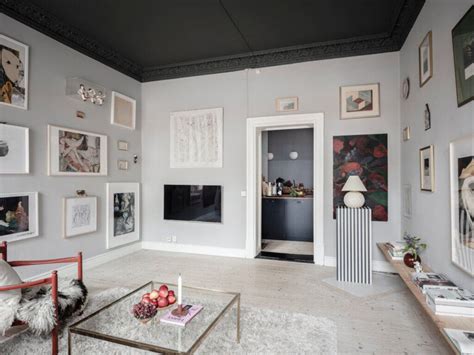 A Dark Green Painted Ceiling In An Art Filled Apartment The Nordroom