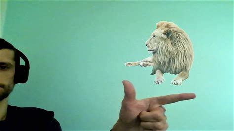 Augmented Reality Motion Holograms With Live Hand Display And