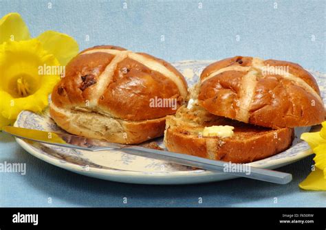 Toasted And Buttered Hot Cross Buns At Easter England UK Stock Photo