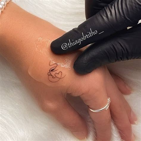 Minimalist Coffee Cup Tattoo On The Hand
