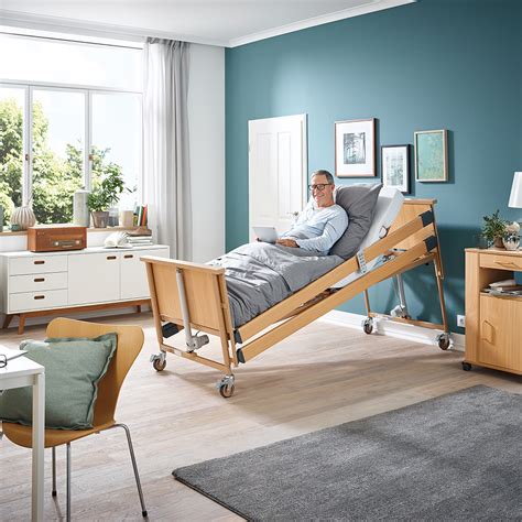 Pflegebett Dali mit Holzhauben Holz liegefläche Bordstein kante