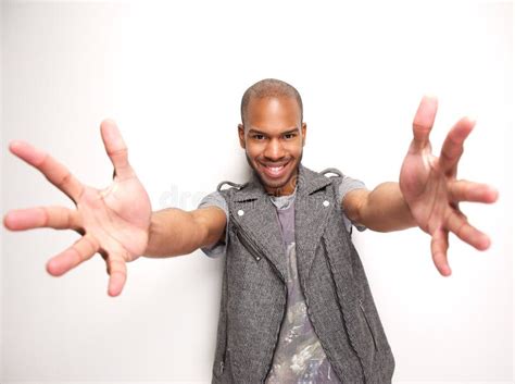 Smiling Man With Arms Outstretched And Hands Open Stock Photo Image