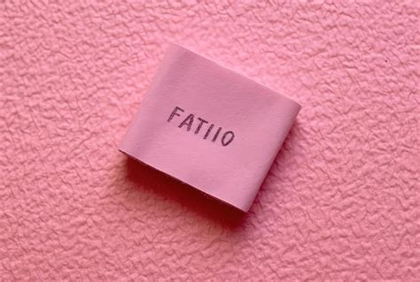 Premium Ai Image A Small Pink Paper With The Words In The Style Of