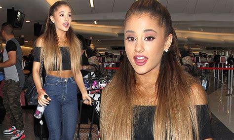 Ariana Grandes Fake Tan Fail In Crop Top And Jeans At The Airport Daily Mail Online