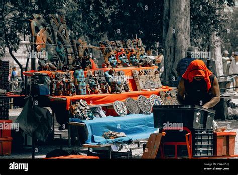 Market Stalls Selling Wooden Masks And Other Local Souvenirs And
