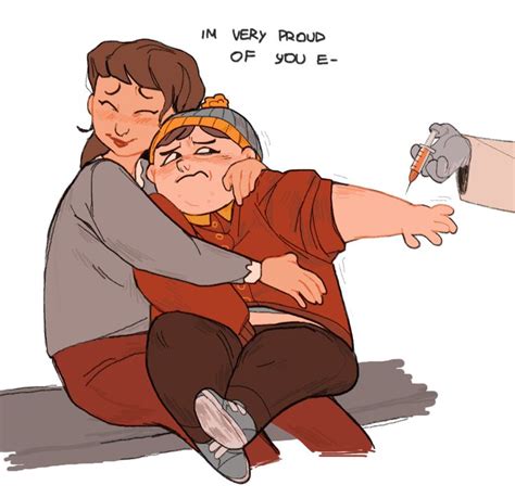 Two People Sitting On The Ground With One Person Hugging And Another