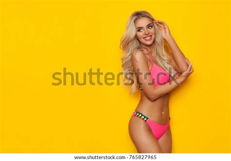 Sexy Blond Woman Pink Bikini Looking Stock Photo 765827965 Shutterstock
