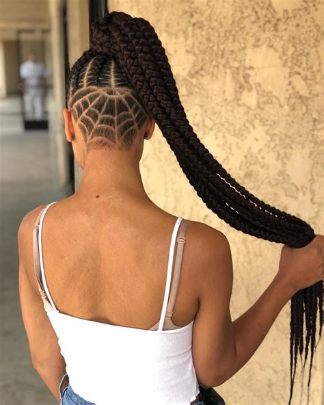 Tresses collées avec rajouts sur cheveux afro crépus naturels Feed in