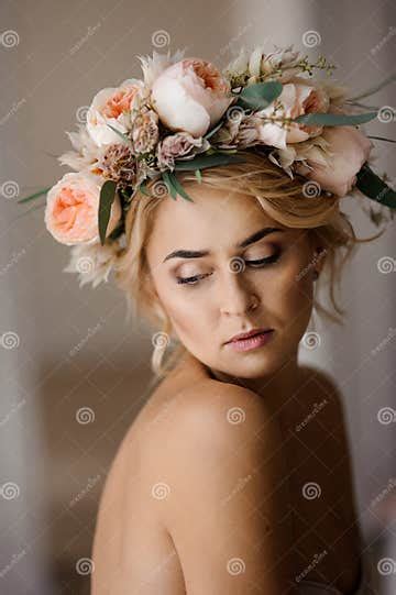 Portrait Of The Beautiful Topless Blonde Woman In A Floral Wreath With Closed Eyes Stock Image