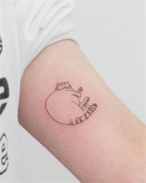 Illustrative Style Cat Tattoo Located On The Inner Arm