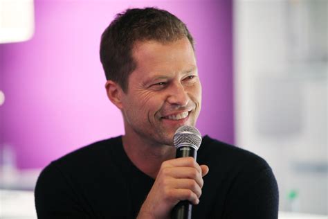 Man Wearing Black Shirt Holding Gray Microphone On Left Hand HD