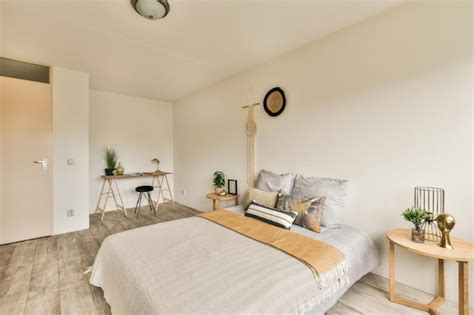 Premium Photo A Bedroom With A Large Bed And A White Bed
