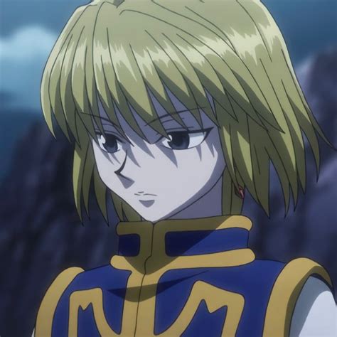 An Anime Character With Blonde Hair And Blue Eyes Looks At The Camera