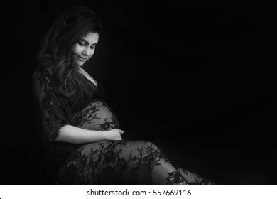 Pregnant Indian Woman Looking Her Belly Stock Photo 557669116