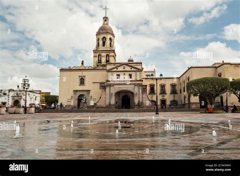 Fountain And Holy Cross Church And Franciscan Convent Also Called The
