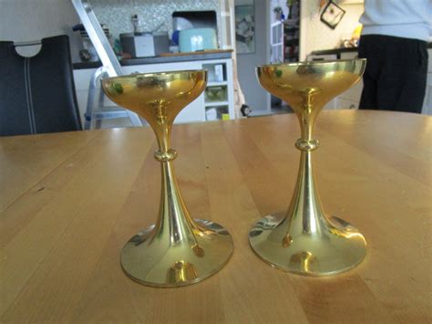 Se produkter som liknar MÄSSING LJUSSTAKAR 2 ST på Tradera 630975432
