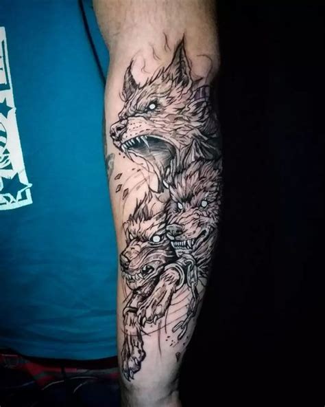 A Man With A Wolf Tattoo On His Arm