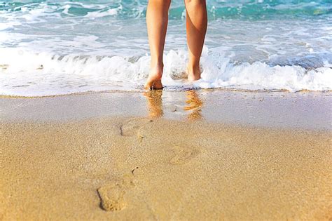 Womans Legs Going To Sea Walking Steps Beach Photo Background And