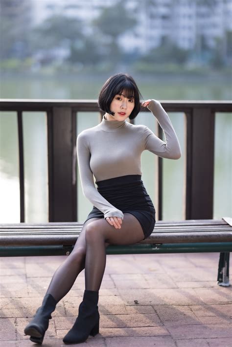 Asian Brunette Girl Bench Sitting Legs Stilettos Skirt Blouse
