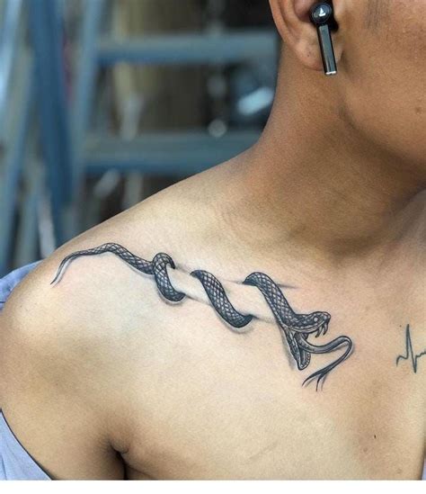 Collar Bone Tattoo For Men Collar Tattoo Snake And Dagger Tattoo