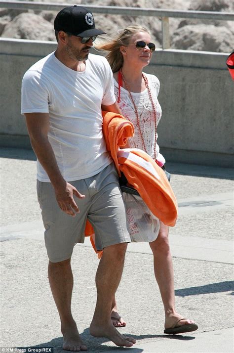 Leann Rimes Shows Off Her Very Pert Derriere In Bikini Bottoms As She Enjoys A Beach Holiday In