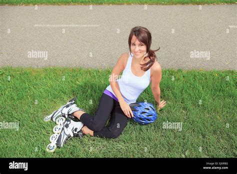 A Roller Skating Girl In Park Rollerblading On Inline Skates Stock