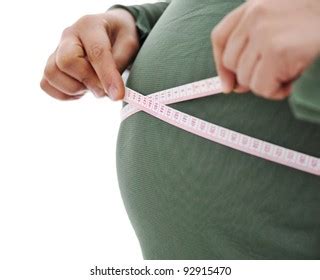 Pregnant Woman Measuring Her Belly Stock Photo Shutterstock