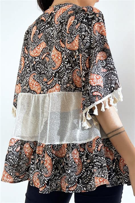 Tunique noire ajourée façon bohème avec pompons et motifs