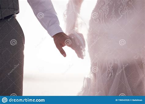 Man And Woman Hold Hands Close Up Stock Photo Image Of Kindness