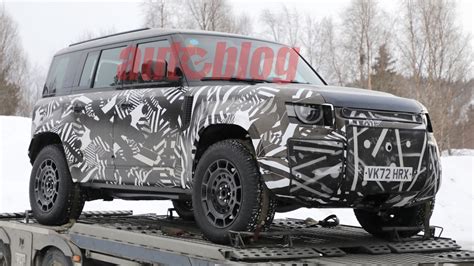 Land Rover Defender V8 SVX Spied With Huge Fenders Chunky Off Road
