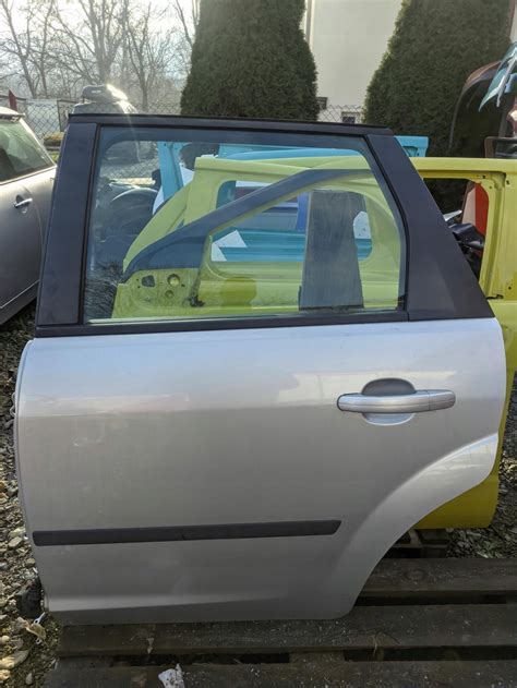 DRZWI LEWY TYŁ FORD FOCUS II MK2 DRZWI TYLNE LEWE CZARNE za 110 zł z