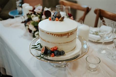 Simple Vanilla Naked Cake With Figs Raspberries And Olive Branch