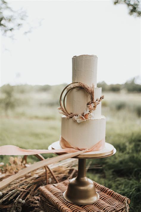 Bohemian Ethereal Wedding Ideas With A Naked Tipi Peacock Chairs